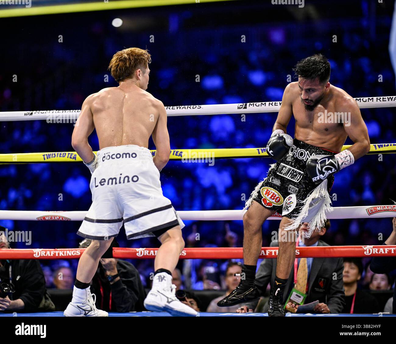 Champion Naoya Inoue (white gloves) of Japan and Ramon Cardenas (black ...