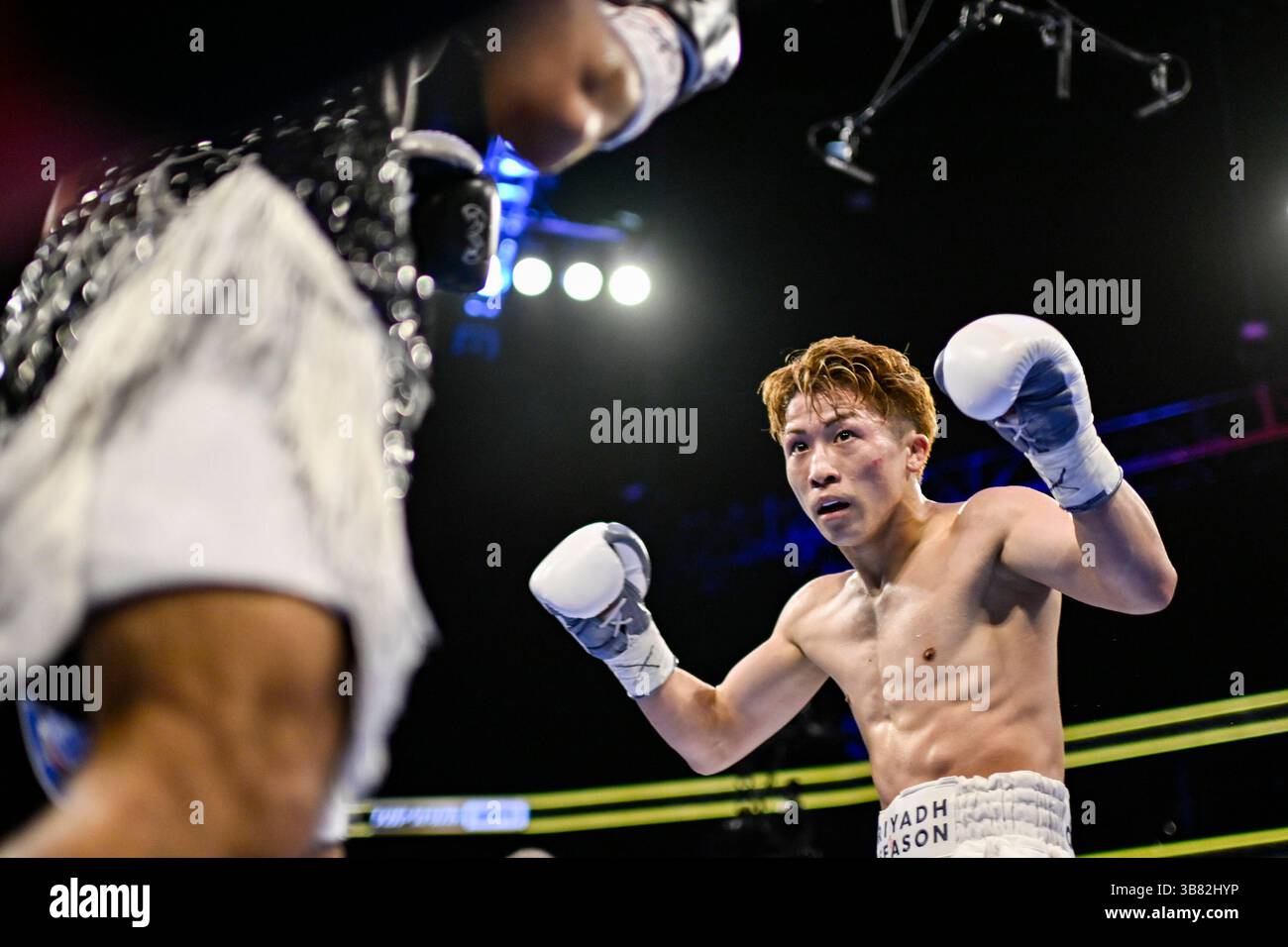 Champion Naoya Inoue (white gloves) of Japan and Ramon Cardenas (black ...