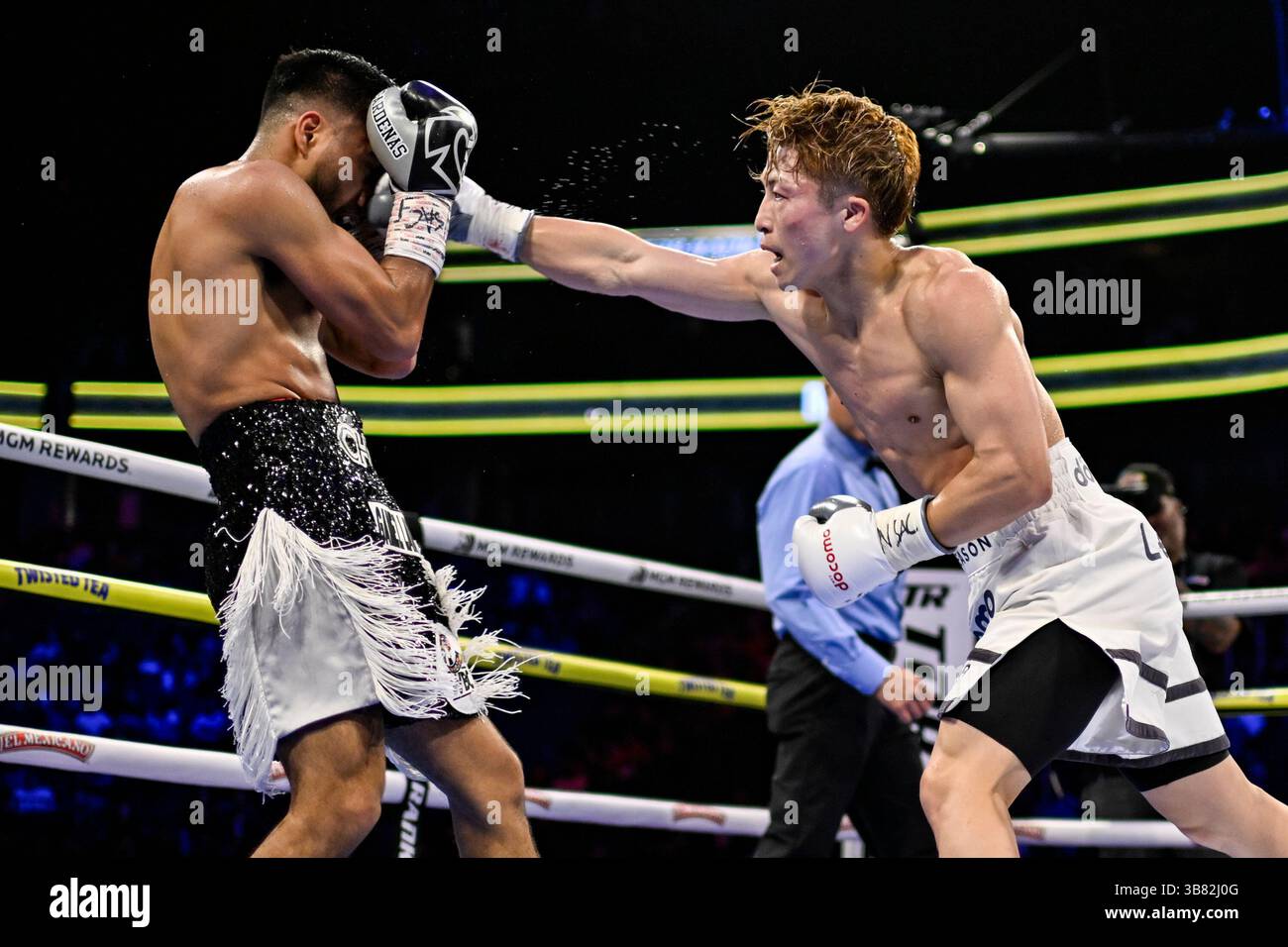Champion Naoya Inoue (white gloves) of Japan and Ramon Cardenas (black ...