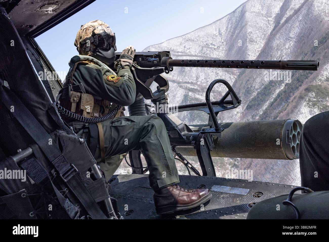 U.S. Marine Corps Cpl. Tristan Walker, a helicopter crew chief with ...