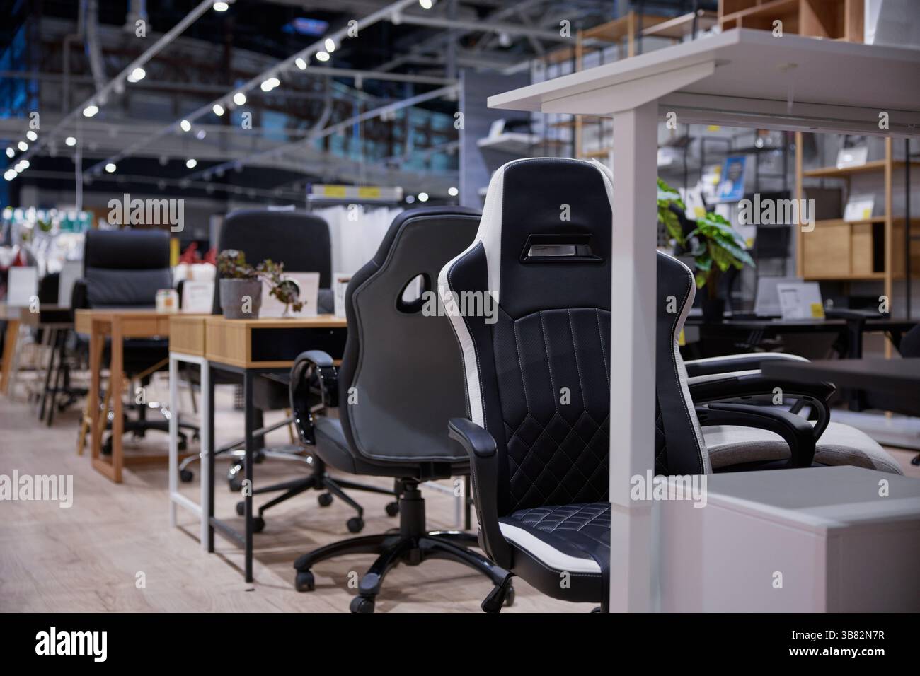 Modern office furniture showroom featuring ergonomic chairs and desks ...