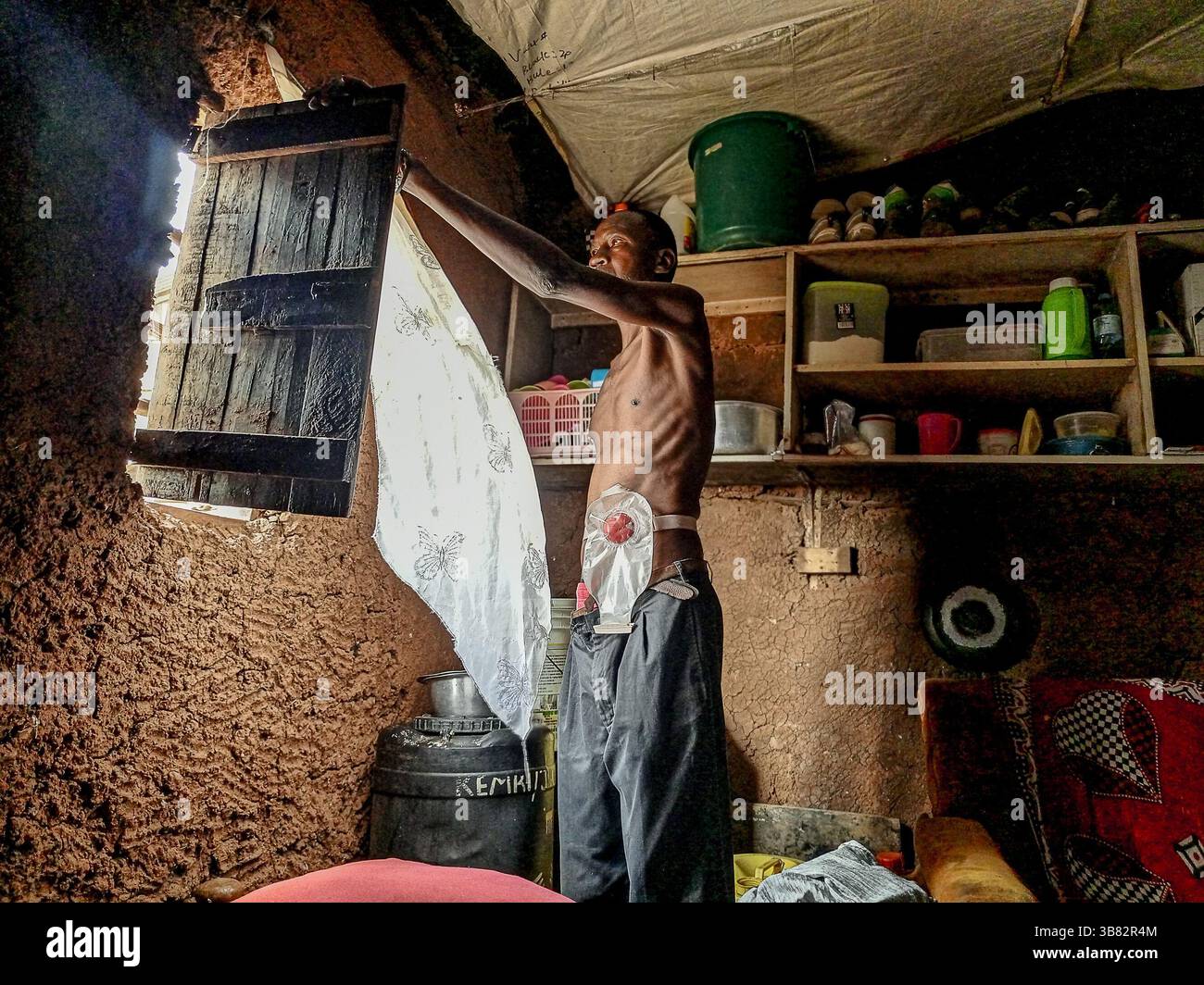 October 7, 2023, NAIROBI, KENYA: 54-Year-Old Tom Okoth postures wearing ...