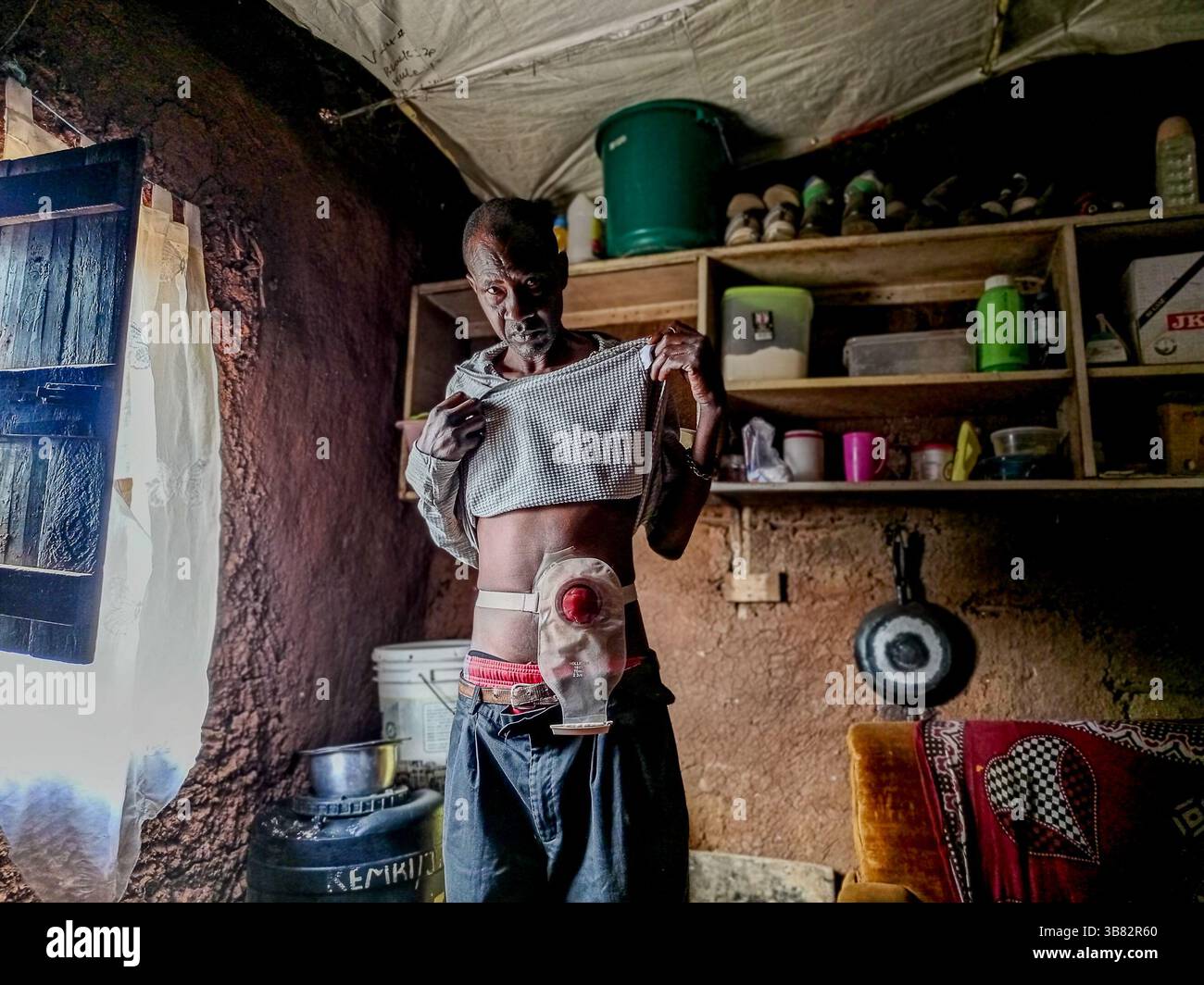 October 7, 2023, NAIROBI, KENYA: 54-Year-Old Tom Okoth postures wearing ...