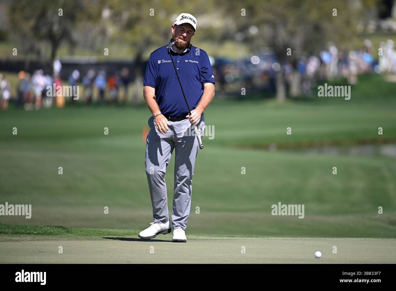 Shane Lowry, of Ireland, reacts after missing his putt on the sixth ...
