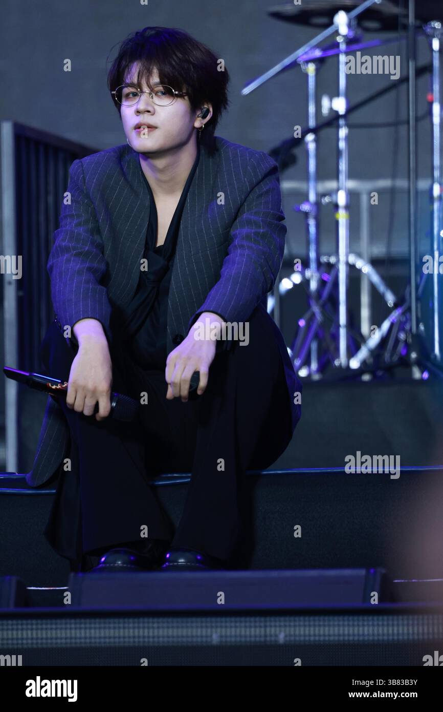 Chinese singer Shi Kai performs at a music festival in Foshan City ...