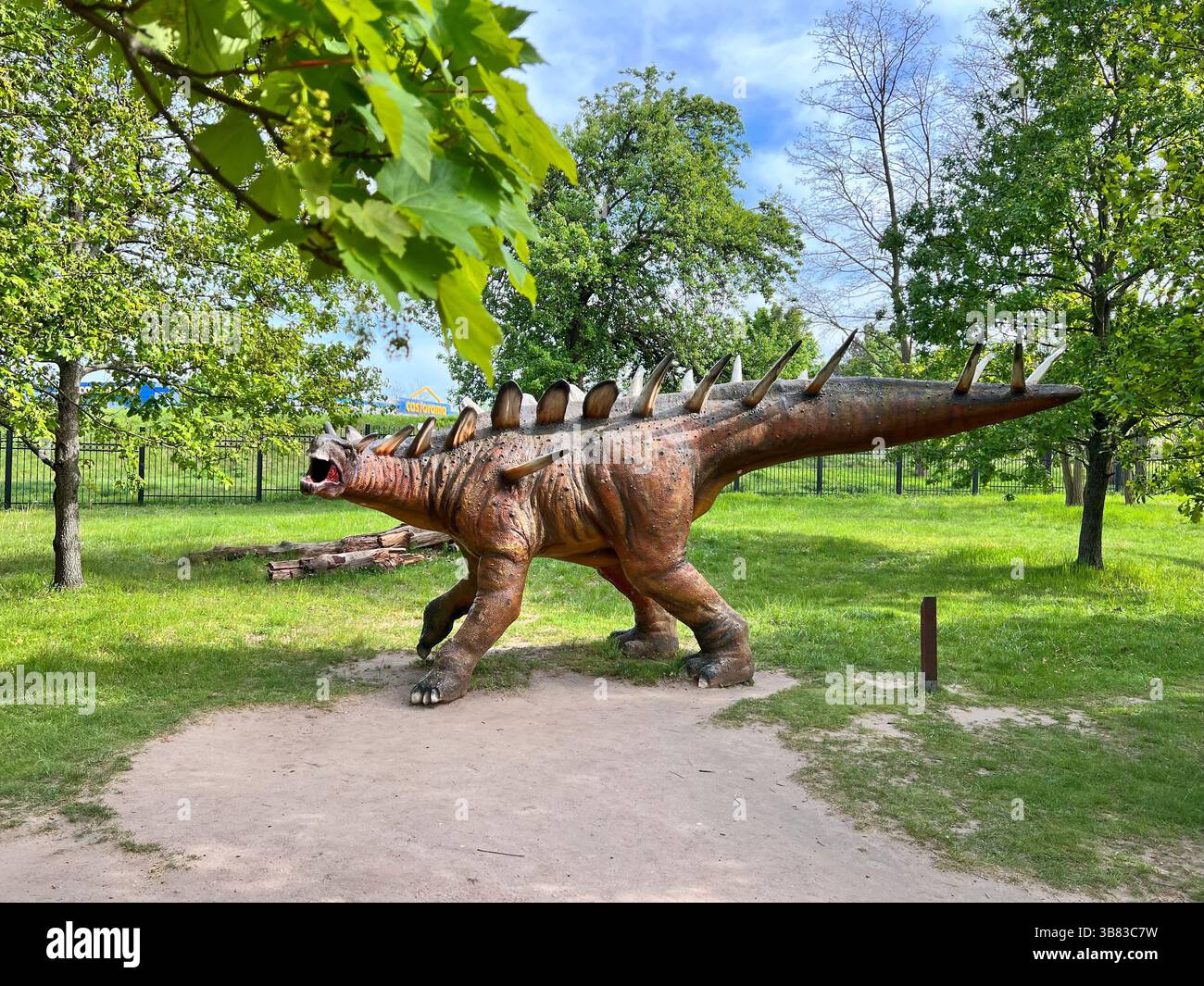 Dinosaur sculptures in Lubin Park, Poland, outdoor exhibit Stock Photo ...