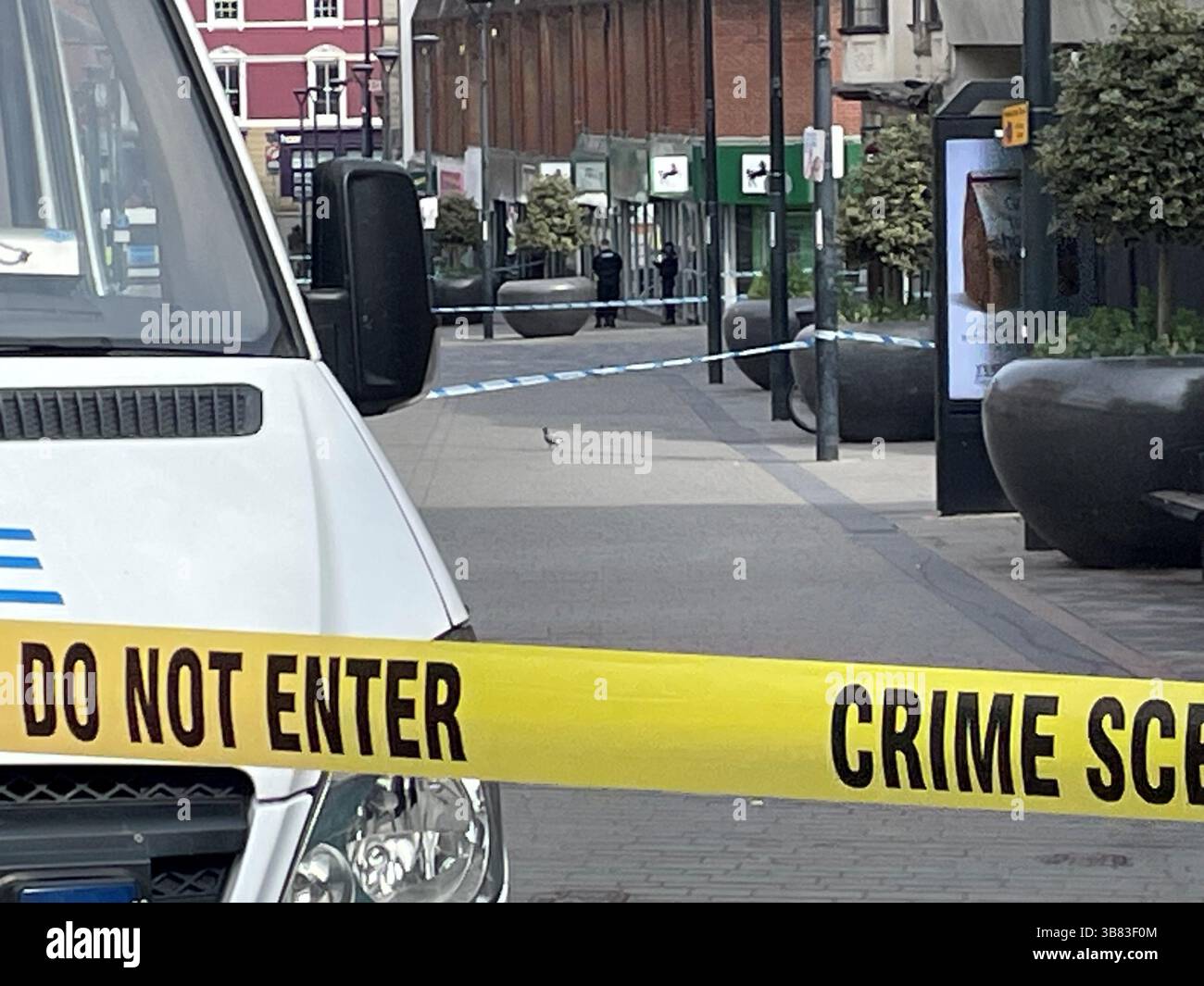 The scene in St Peter's Street, Derby, as a murder inquiry continues ...