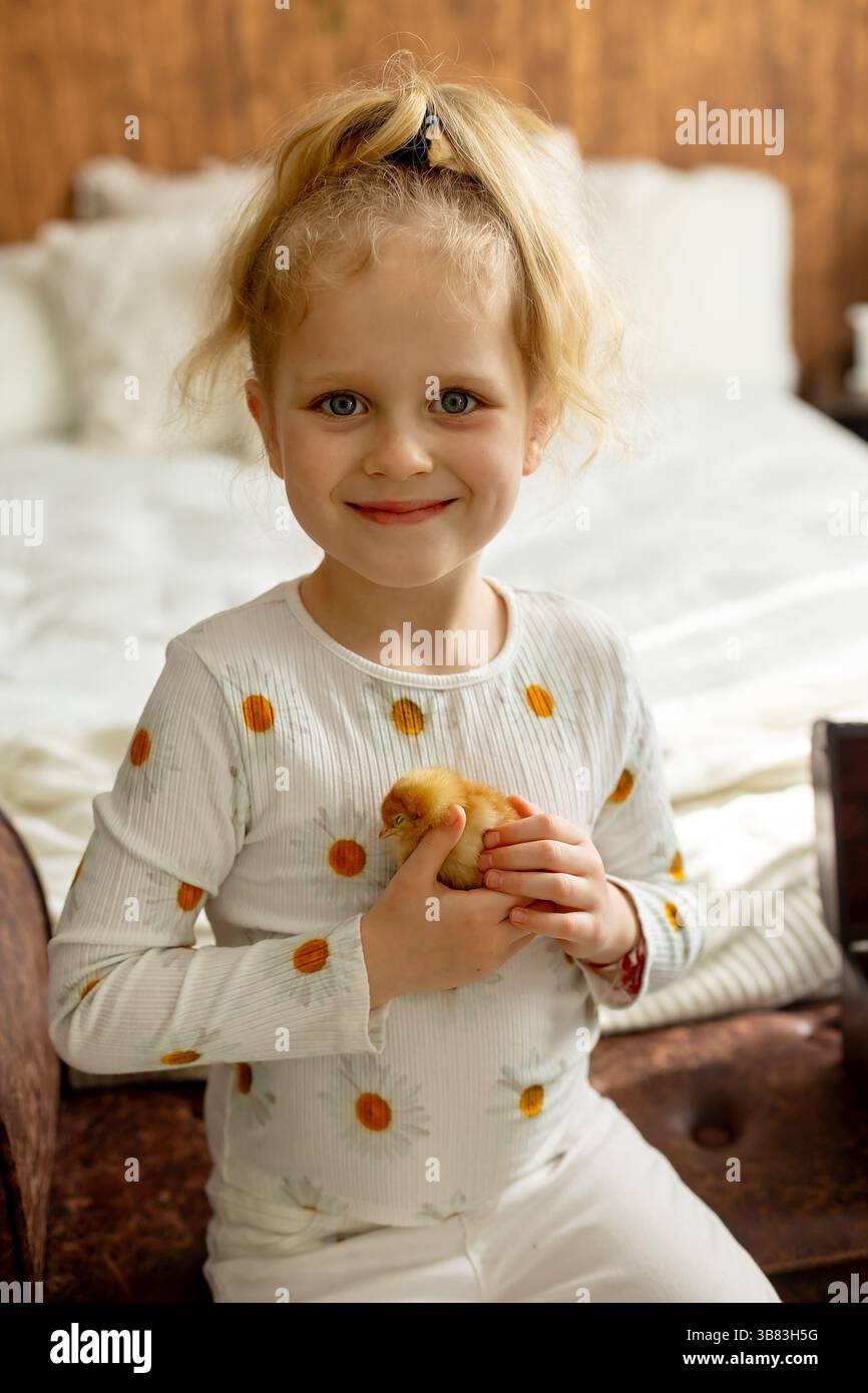 Cute sweet little children, blond boy and girl, playing with little ...