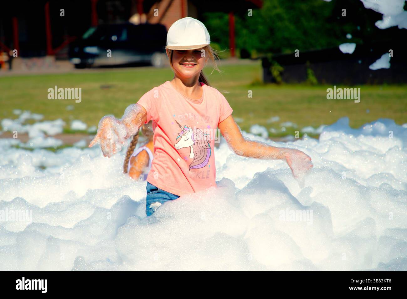 Child playing in outdoor foam hi-res stock photography and images - Alamy