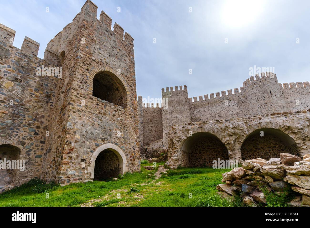 Historic stone castle wall featuring intricate architecture Stock Photo ...