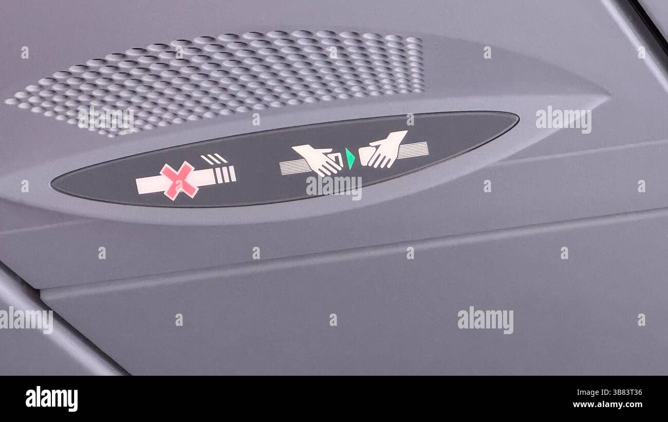 Airplane lavatory occupancy indicator with red cross and hands symbols ...