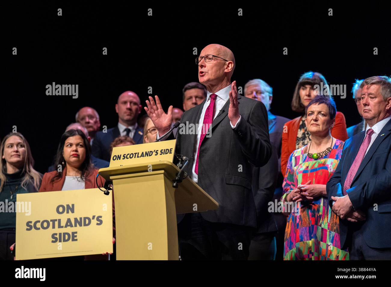 First Minister of Scotland and SNP leader John Swinney speaking at ...