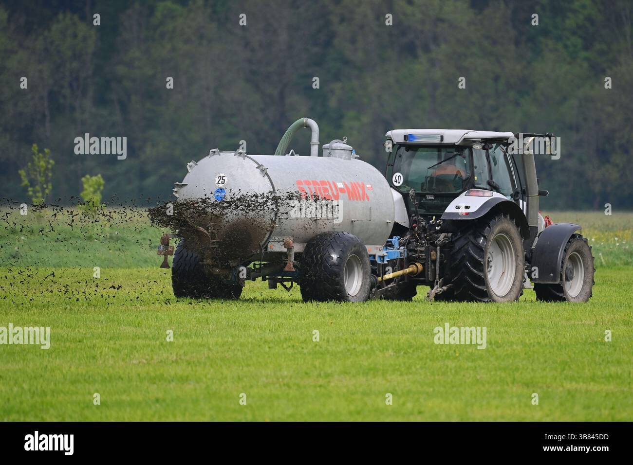 Gmund, Deutschland. 07th May, 2025. A tractor with a slurry tank ...
