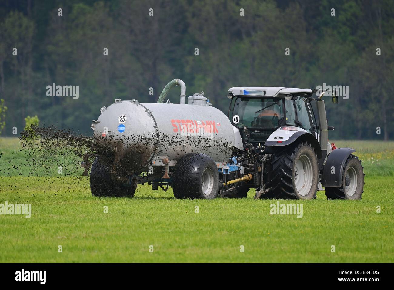 Gmund, Deutschland. 07th May, 2025. A tractor with a slurry tank ...