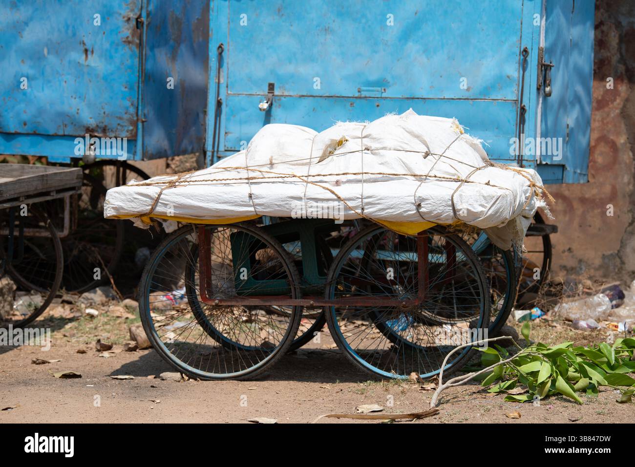 Market stall hand cart standing on a street in India, traditional wagon ...