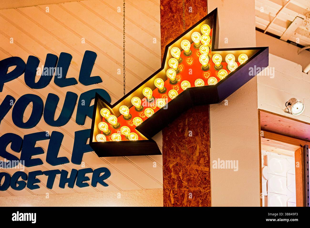 stylish arrow showing direction to fitting room for clothes Stock Photo ...