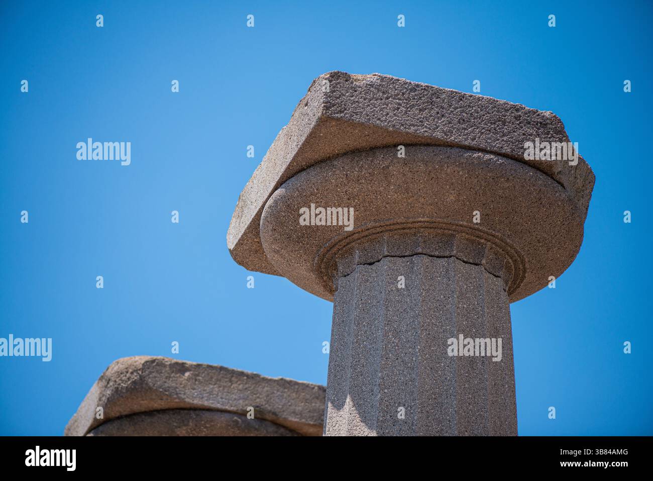 A detailed view of the ancient stone columns of Assos, a historic city ...