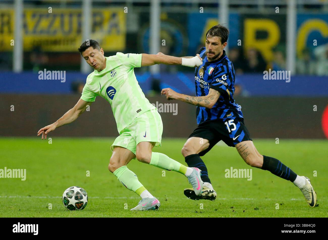 MILAN, ITALY - MAY 6: Robert Lewandowski of FC Barcelona competes for ...
