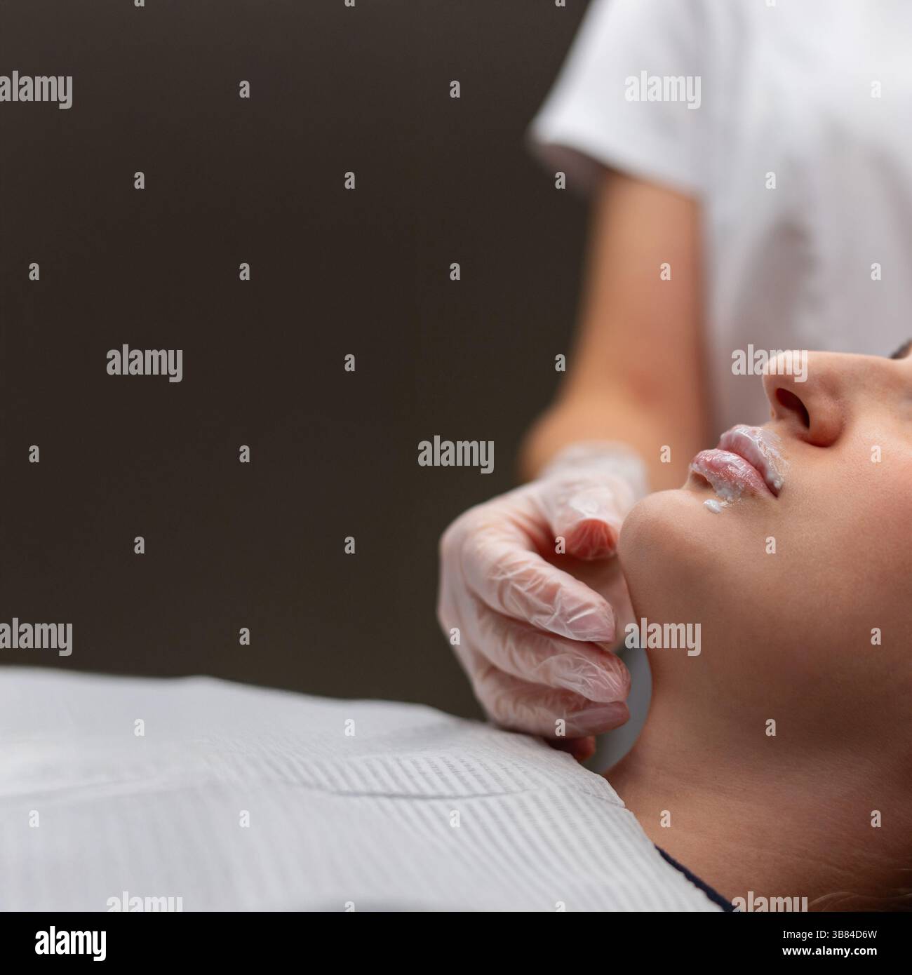 The Girl Is Undergoing Procedures At A Beauty Clinic. Lip Augmentation ...