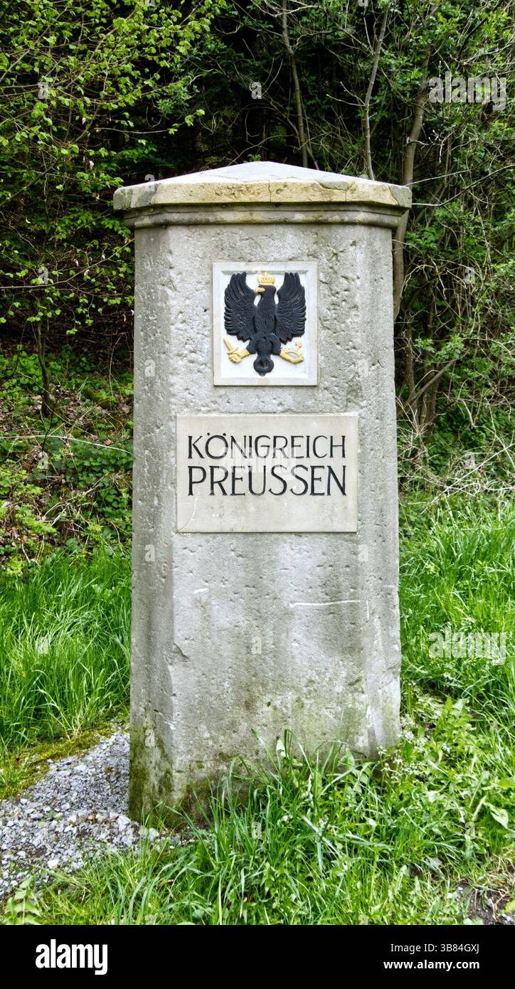 Old stone border marker with the prussian eagle and the inscription ...