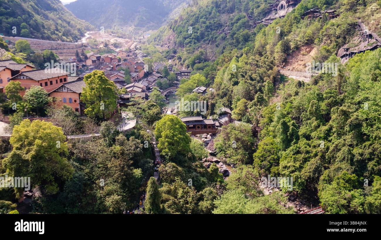 Traditional chinese mountain village with ancient wooden architecture ...