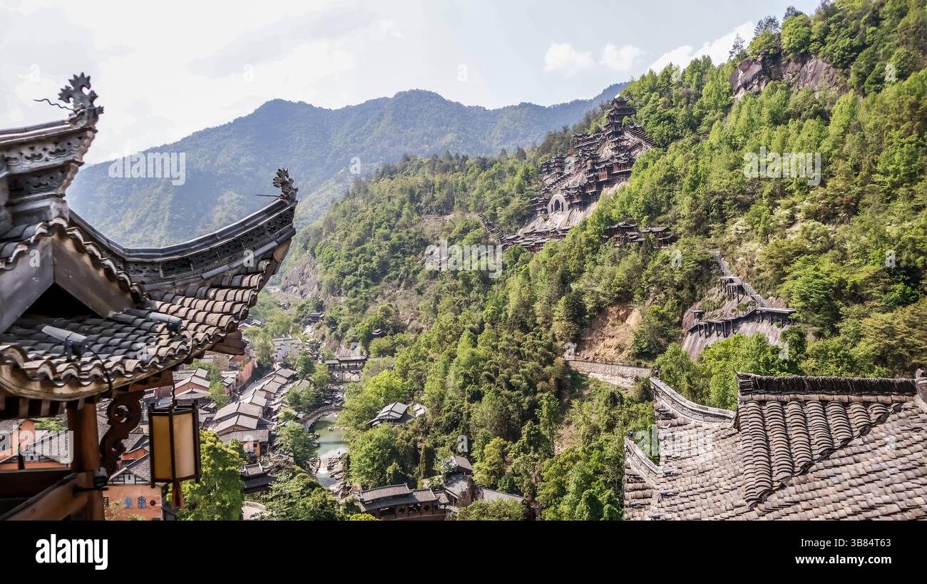 Traditional chinese mountain village with ancient wooden architecture ...