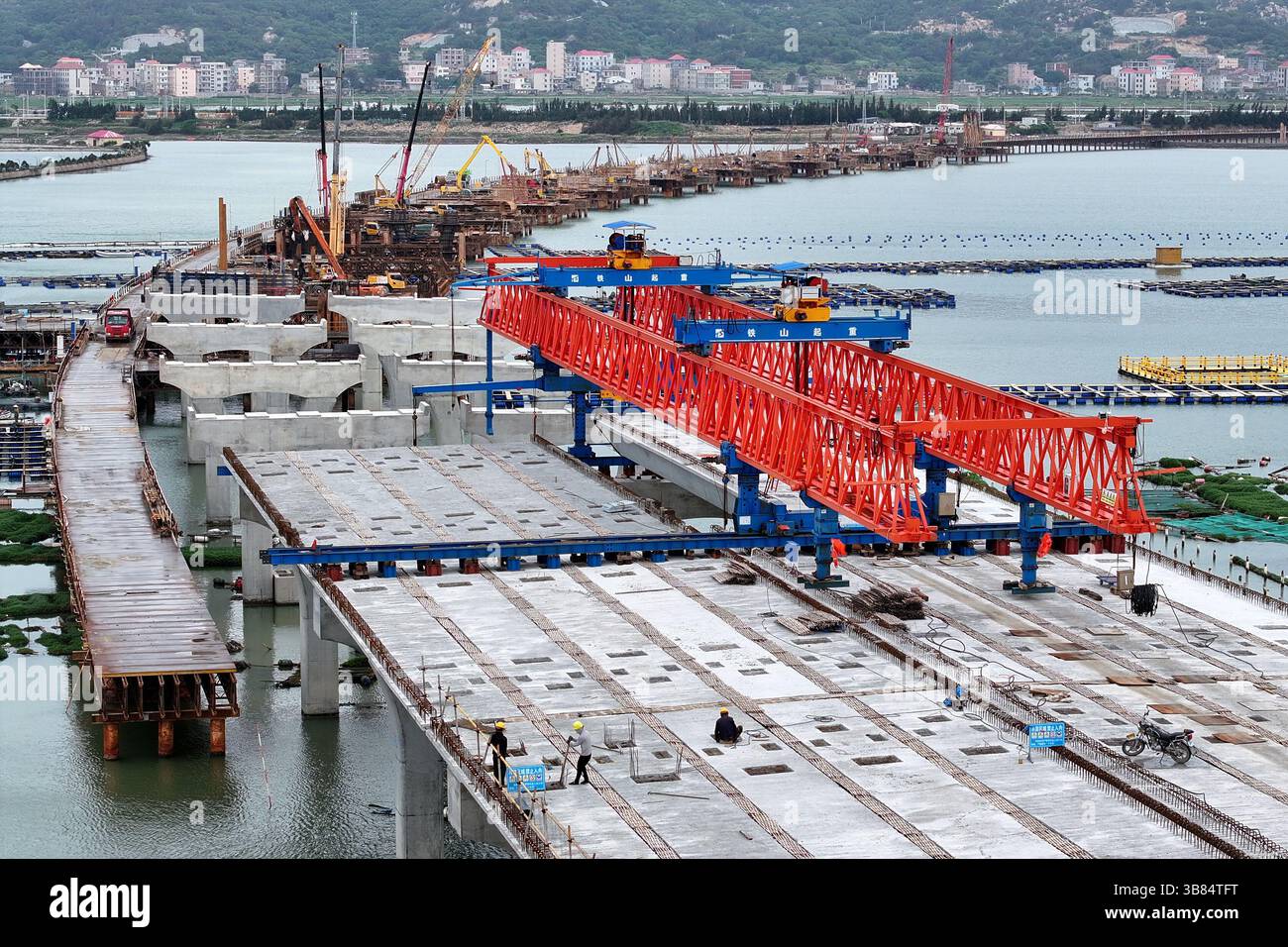 Putian, China. 07th May, 2025. Workers are engaged in construction at ...