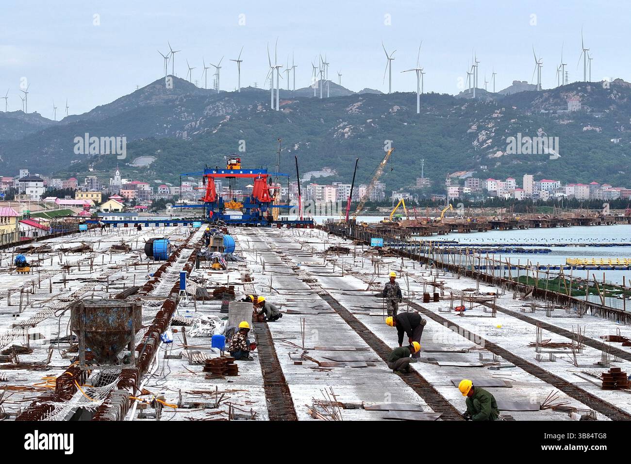 Putian, China. 07th May, 2025. Workers are engaged in construction at ...