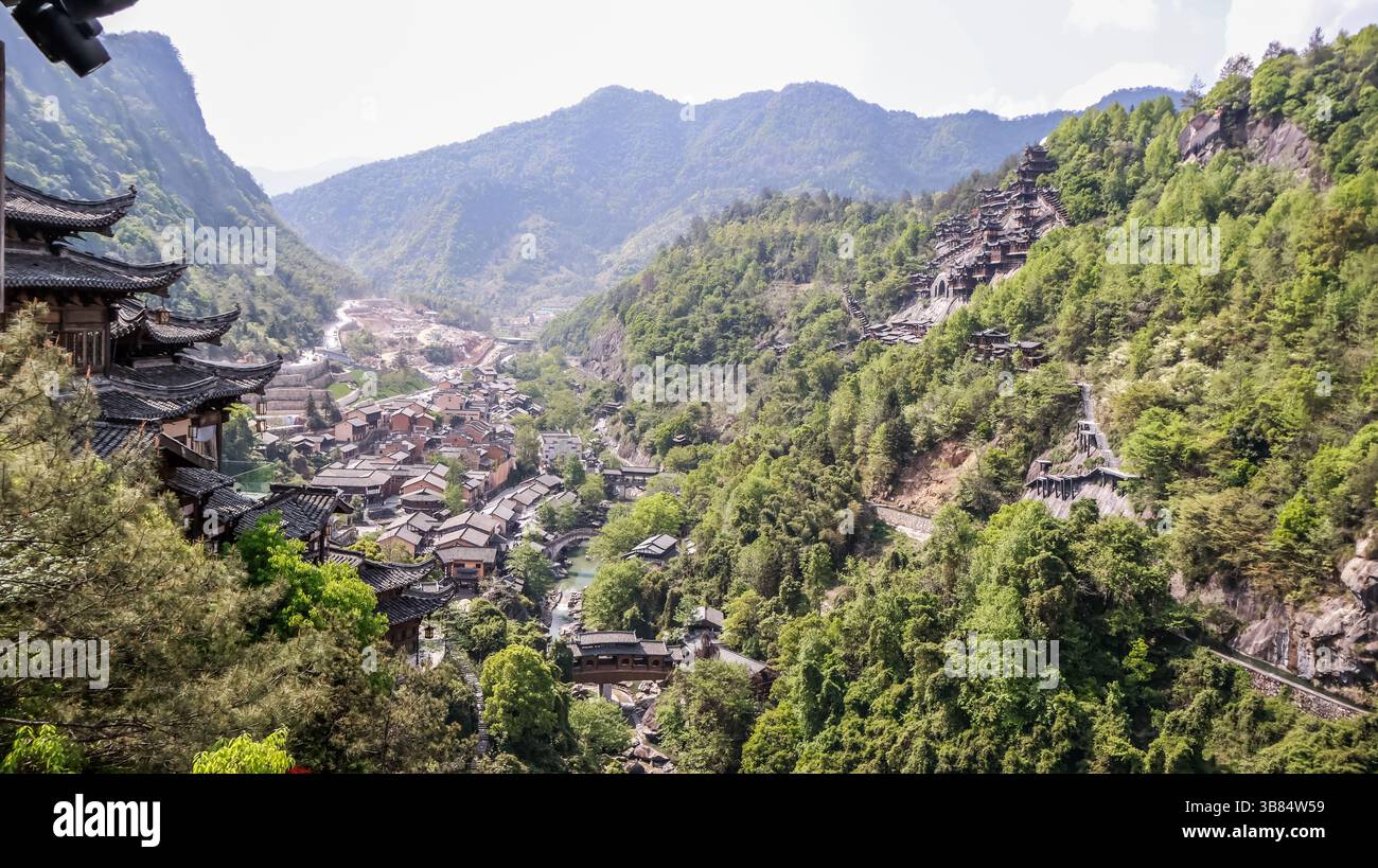 Traditional chinese mountain village with ancient wooden architecture ...