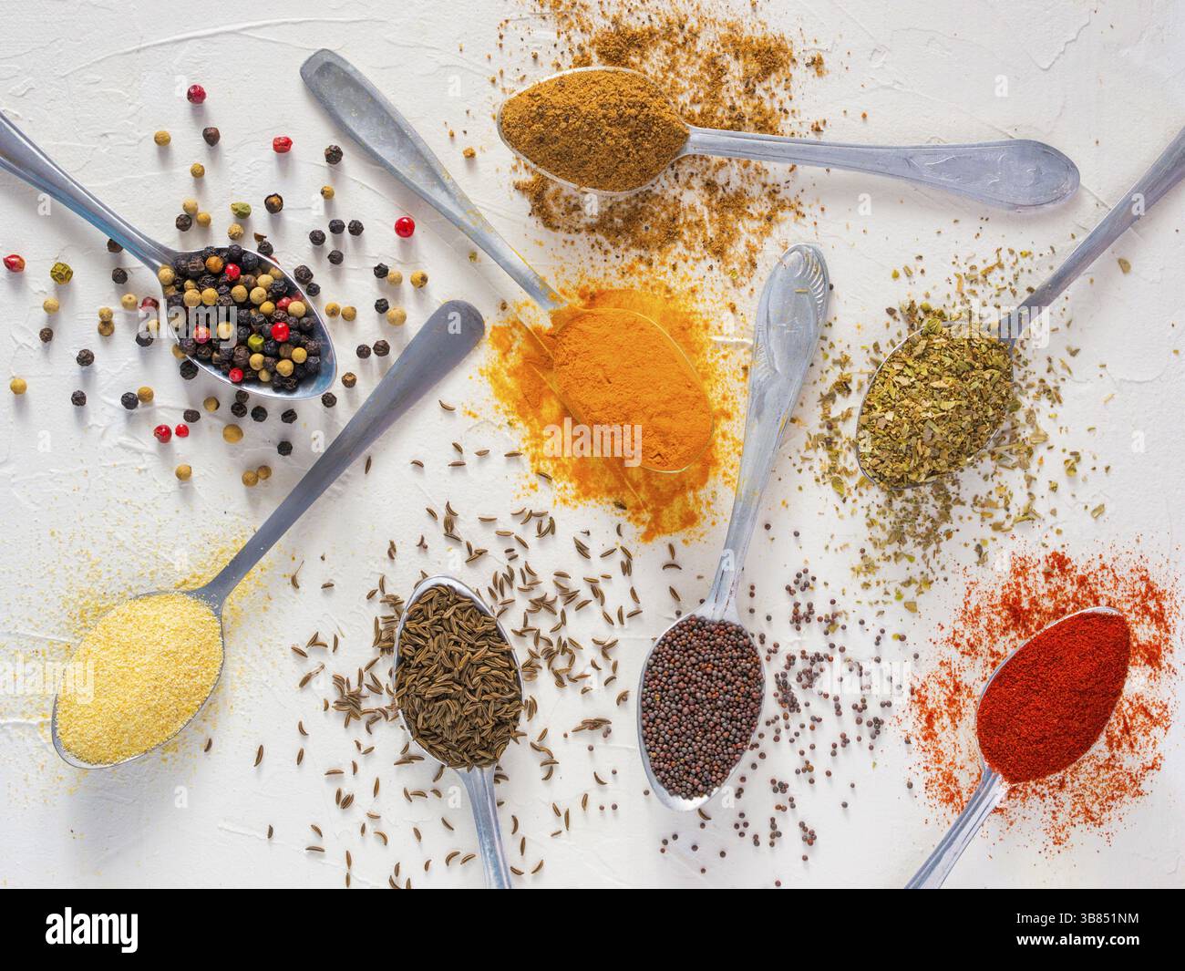 Top view mix indian spices and herbs difference on white background ...