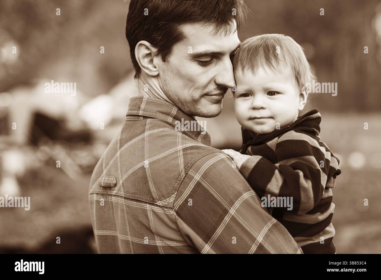Happy father looks camera hi-res stock photography and images - Alamy