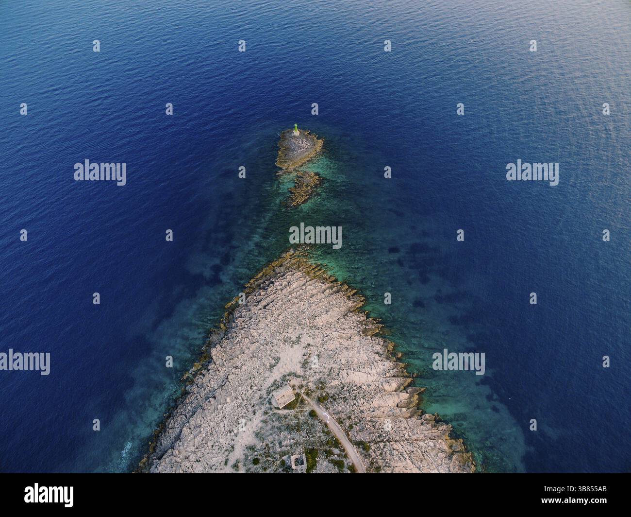 Aerial view of a small island in front of Punta Planca cape Stock Photo ...