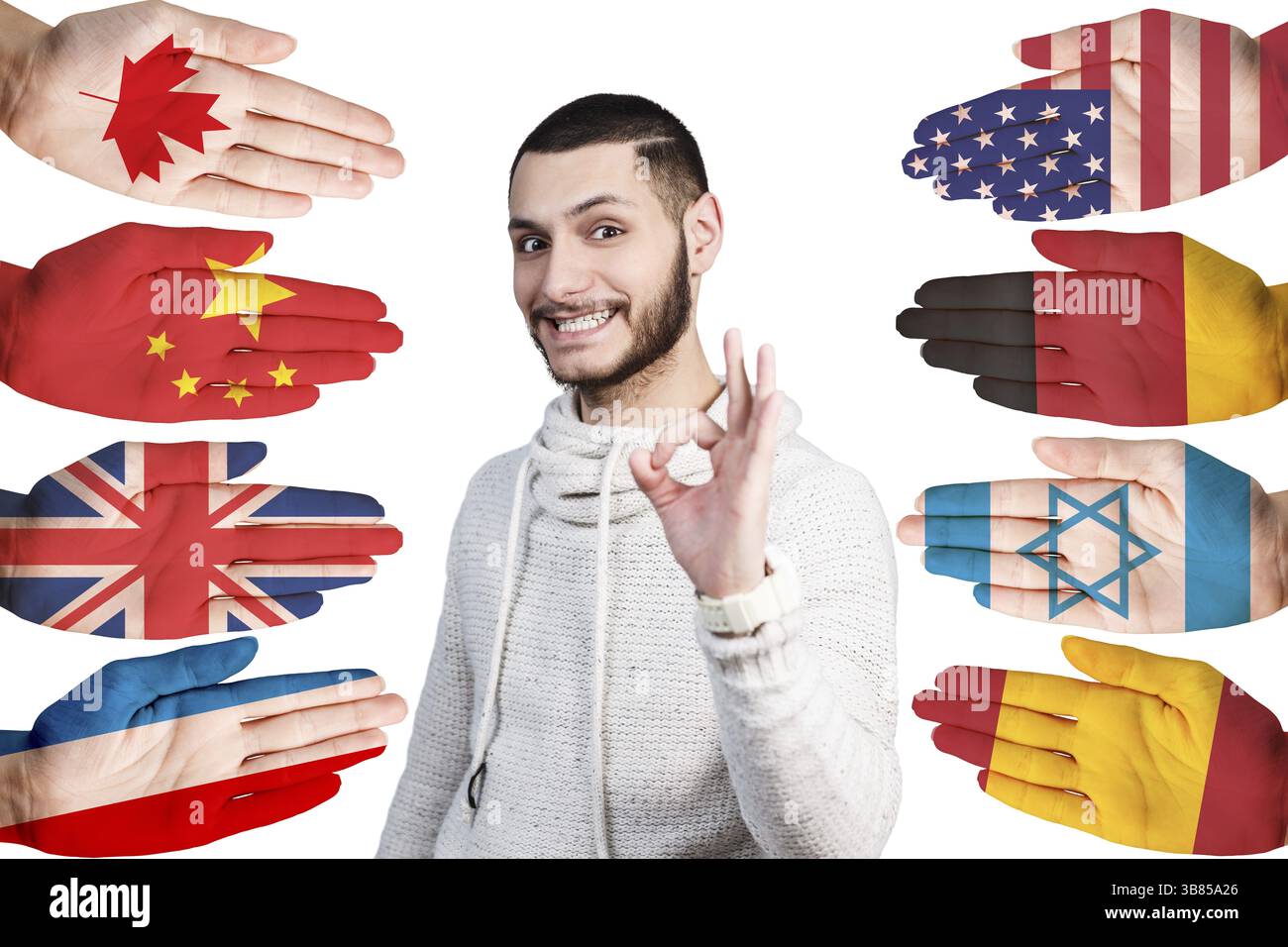 Young man and many hands with different country flags painted on them ...