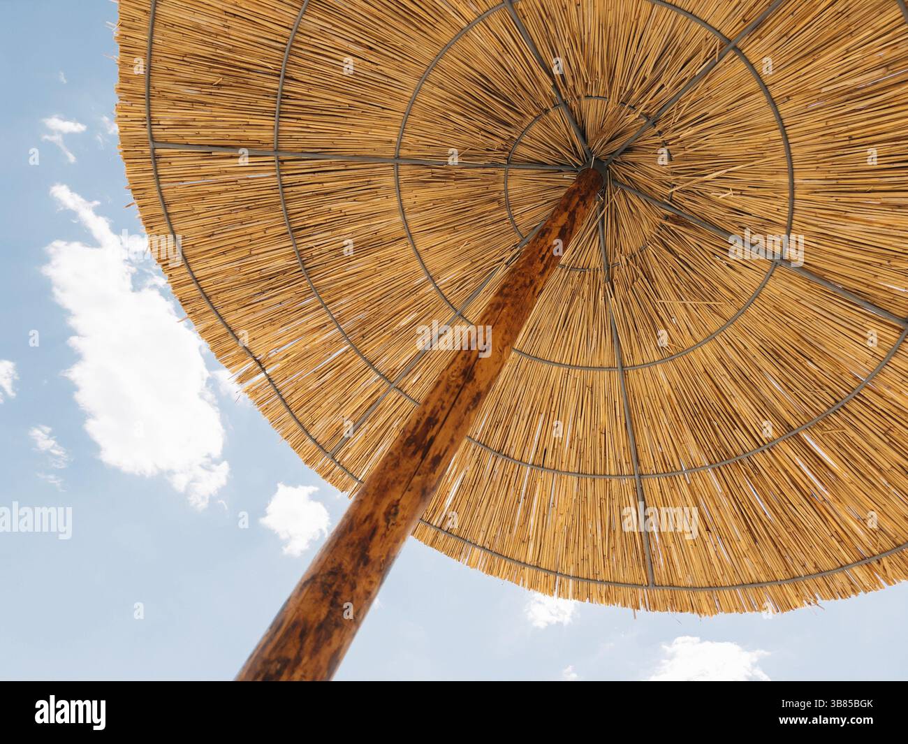 Bottom view straw umbrellas hi-res stock photography and images - Alamy