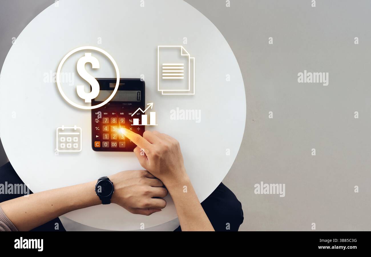 Top view of hands using a calculator on white background, symbolizing finance, budget planning ...