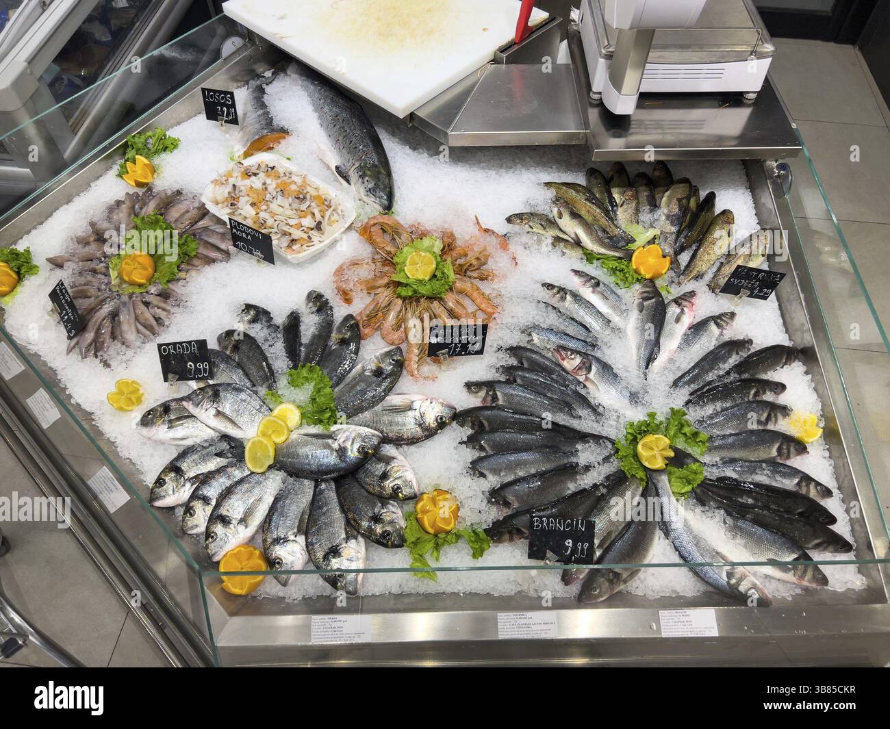 Artistically laid out fish and seafood at the supermarket Stock Photo ...