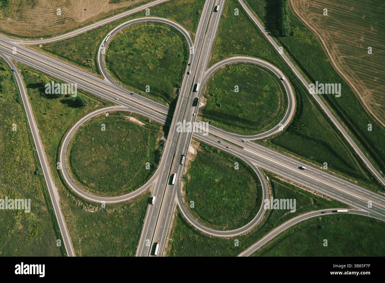 Clover or daisy type of road junction. Aerial top down view of ...