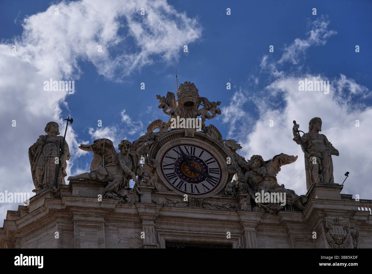 A view of the clock of St Peter's Basilica, at the Vatican, Wednesday ...