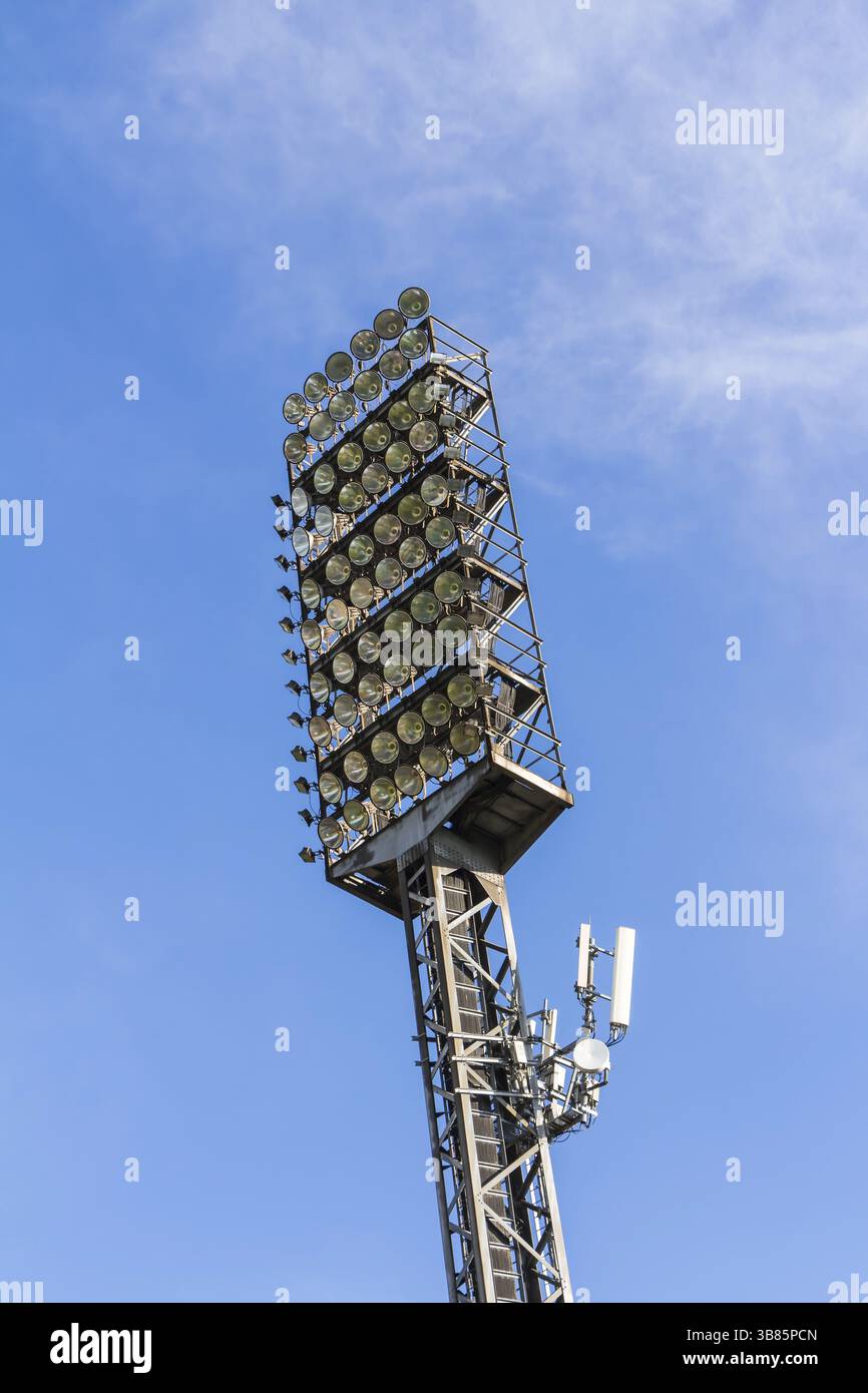 Floodlight mast of a sport stadium Stock Photo - Alamy