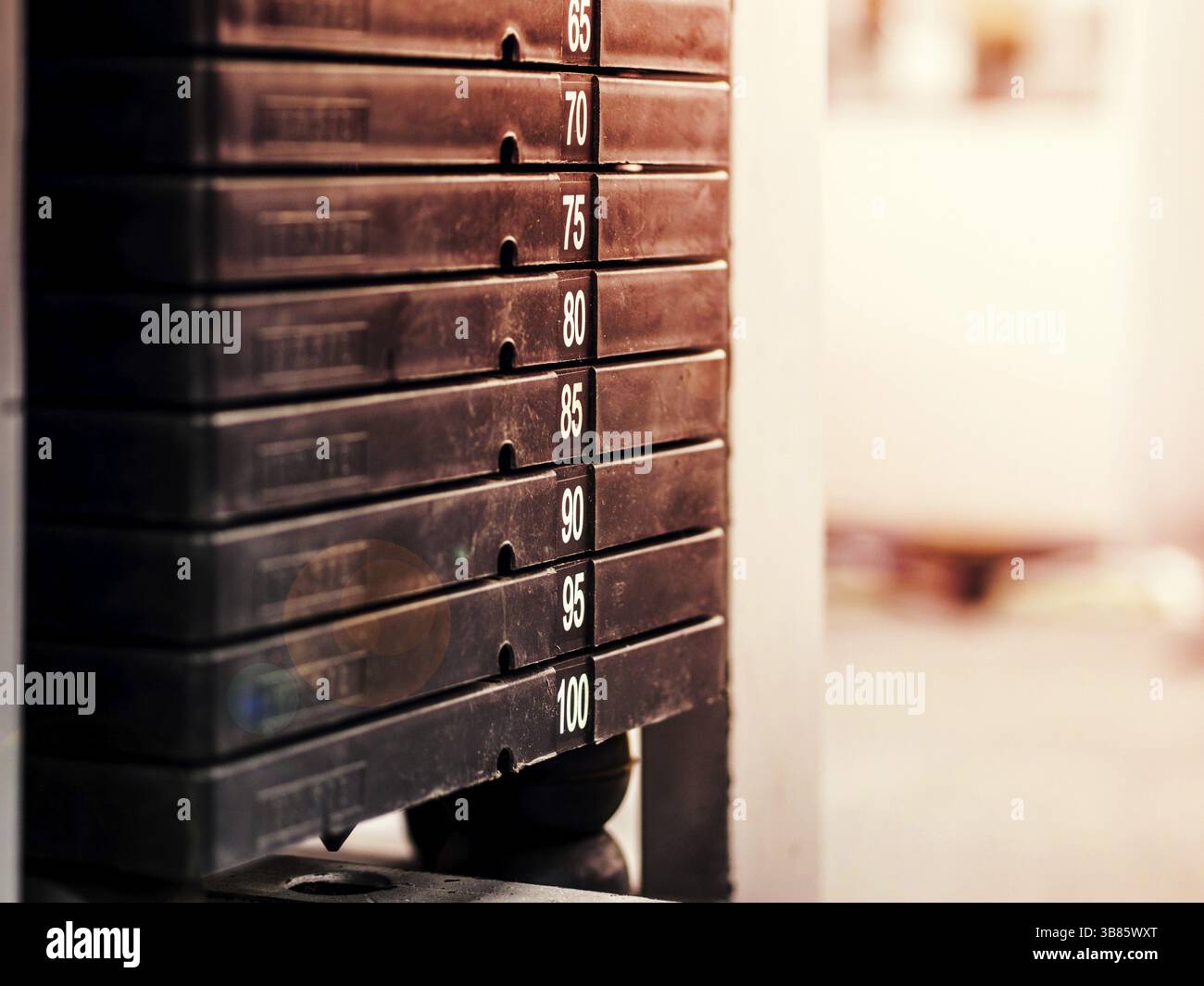 Stack of rusty metal weights in gym bodybuilding equipment ...