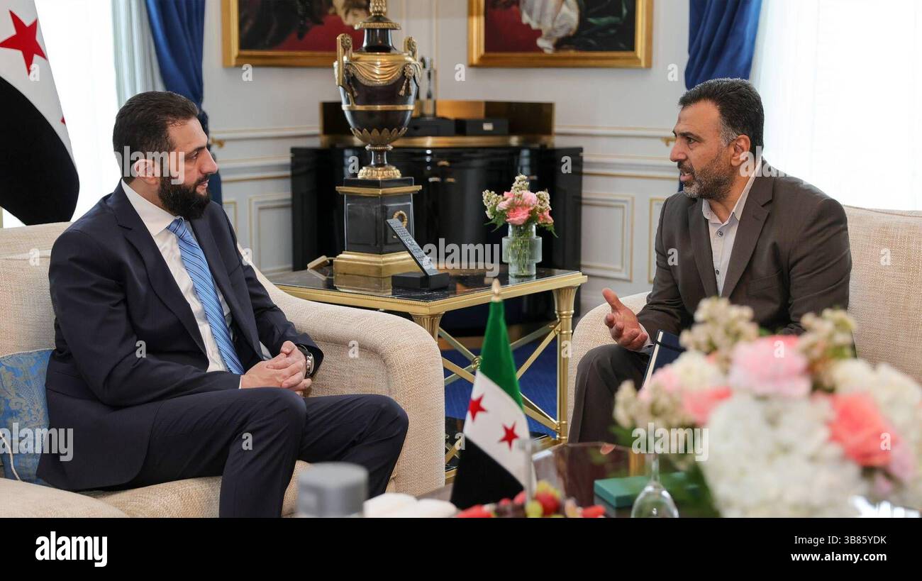 Syrian President Ahmed al-Sharaa meets with Farid Al-Methhane, a former ...