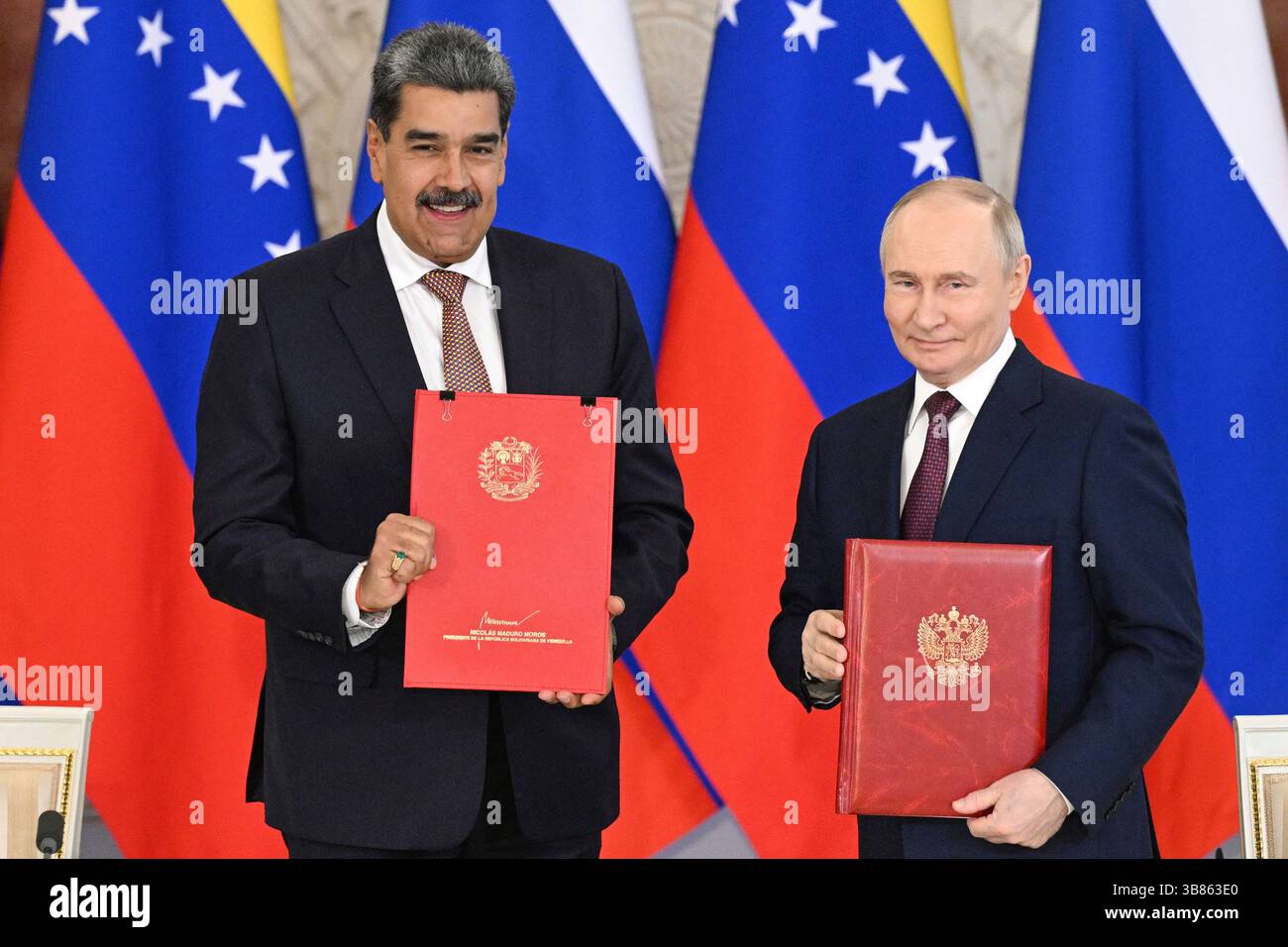 Venezuelan President Nicolas Maduro, left, and Russian President ...