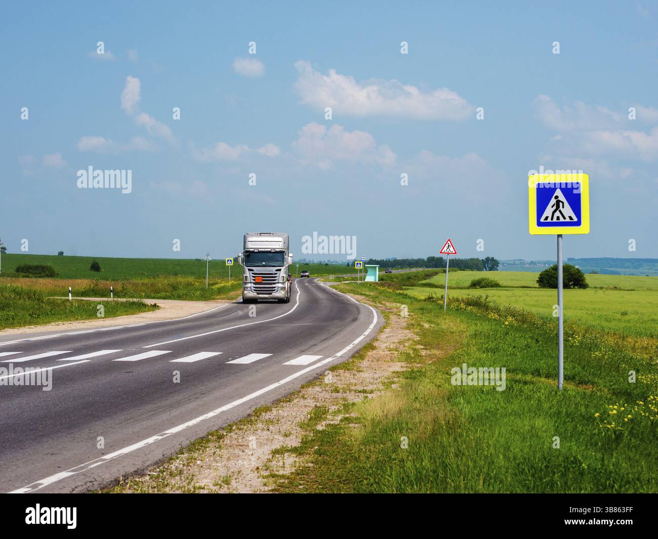 Zebra pedestrian crossing, drive truck cars on road Stock Photo - Alamy