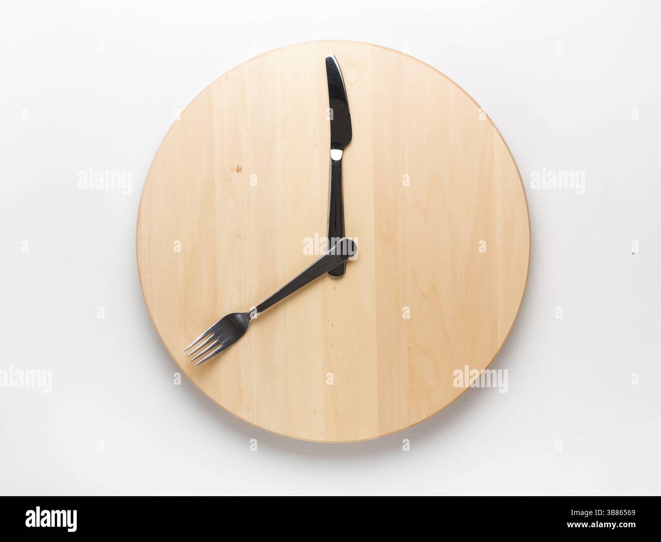 Intermittent fasting and skip breakfast concept - empty wooden round ...