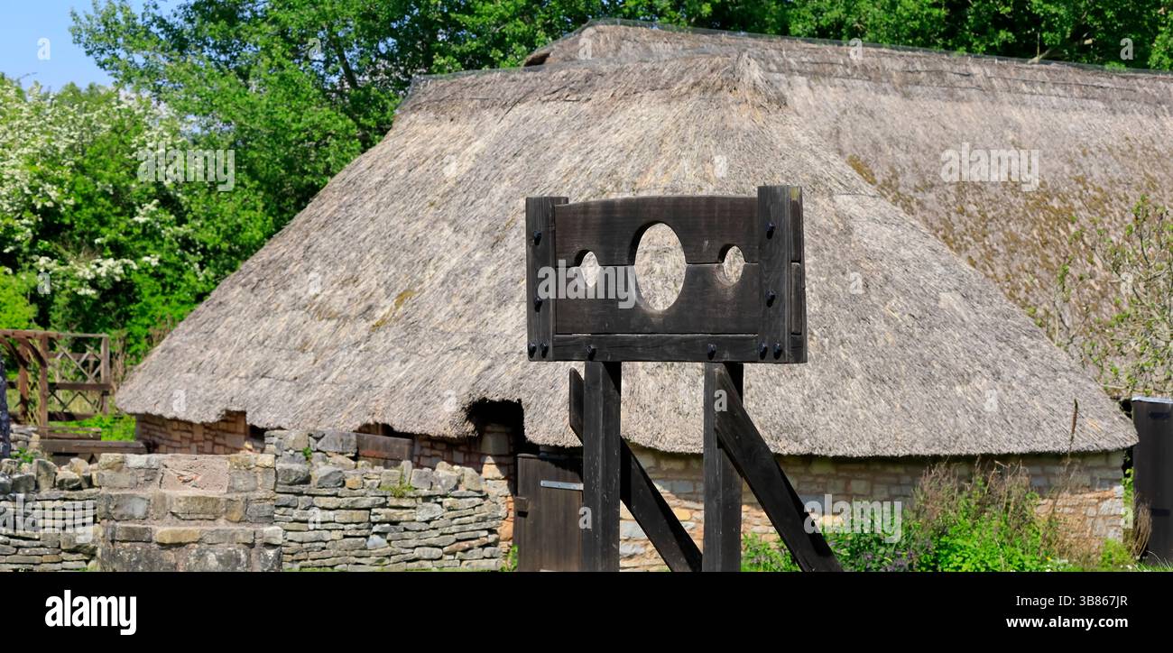 Stocks at Cosmeston mediaeval village open air museum, Cosmeston Lakes ...