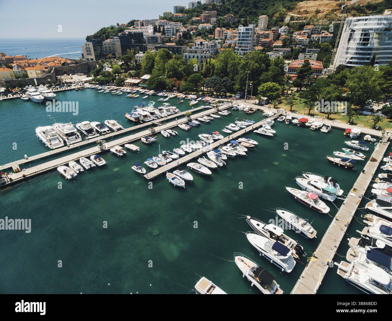Boat dock and yacht port in Budva, Montenegro. Aerial photo from the ...