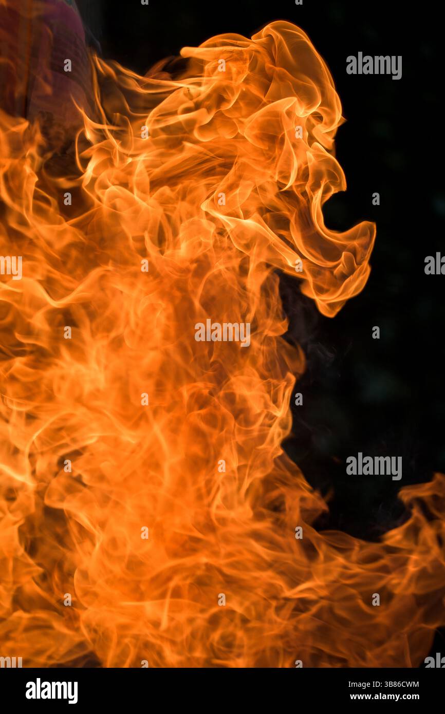 Wall raging fire background movement hi-res stock photography and ...