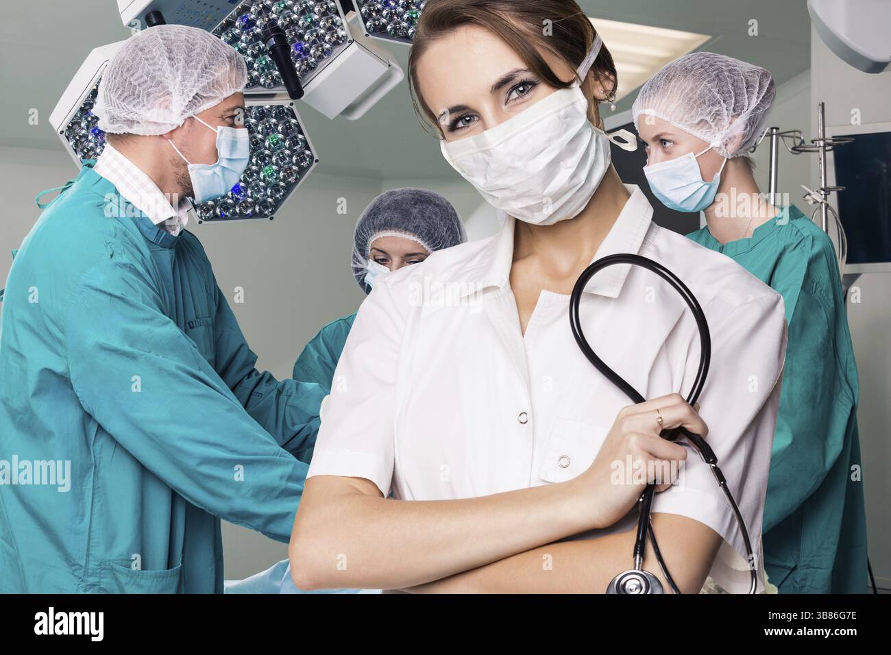 Surgery team operating in a surgical room Stock Photo - Alamy