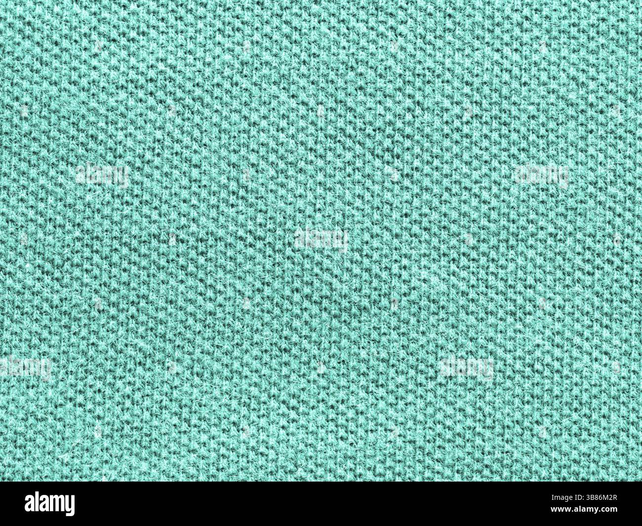 Green knitted Jersey polo texture as textile background Stock Photo - Alamy