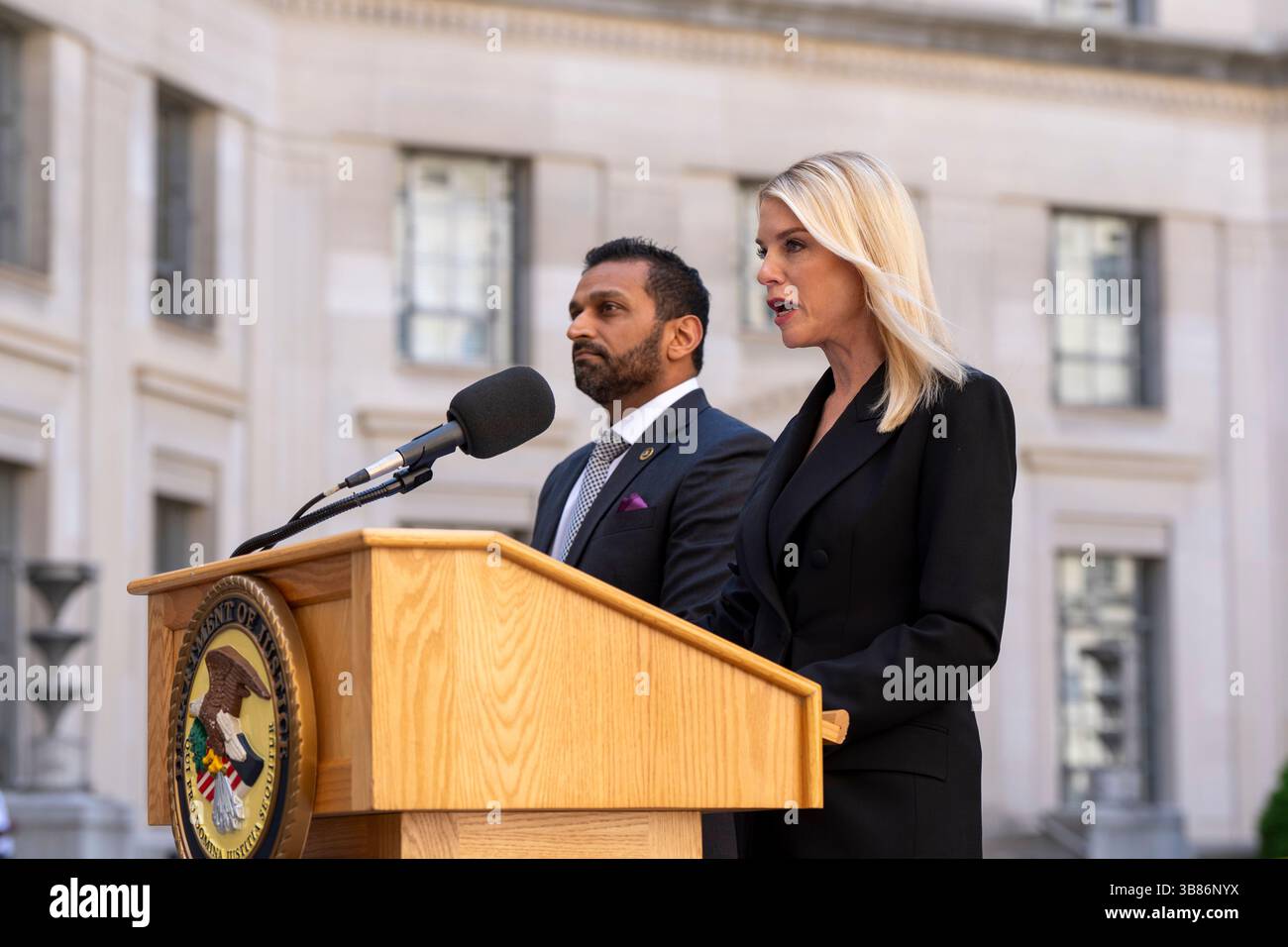 Attorney General Pam Bondi and FBI Director Kash Patel speak during a ...